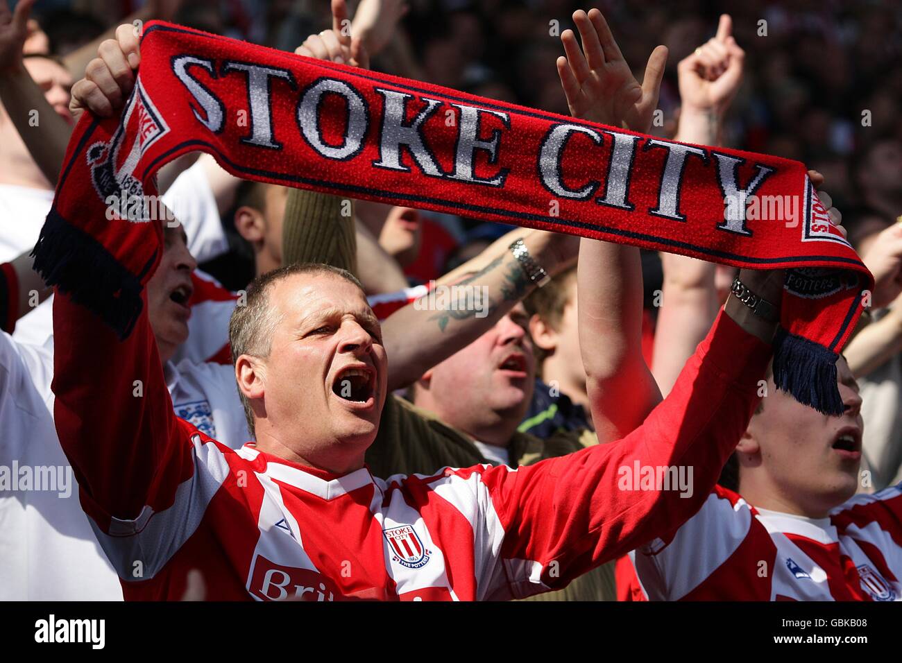 Stoke city fans in the stands show their support hi-res stock ...
