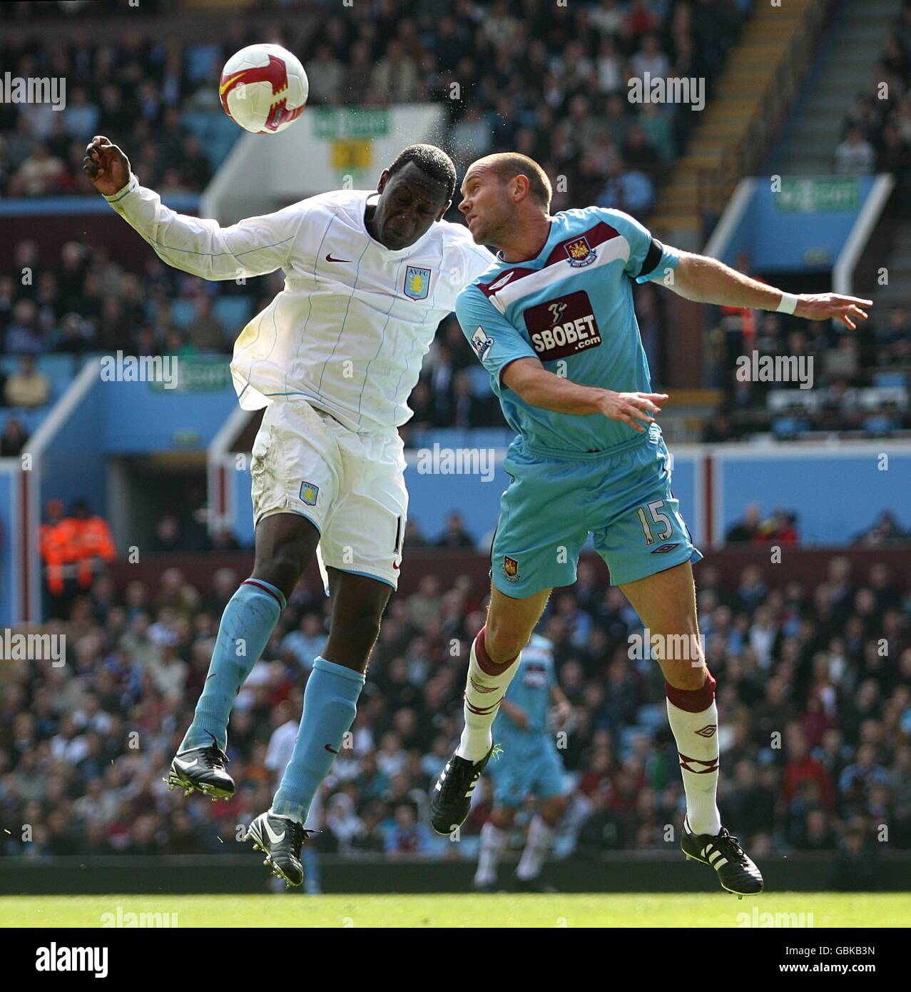 West Ham United's Matthew Upson (right) and Aston Villa's Emile Heskey ...