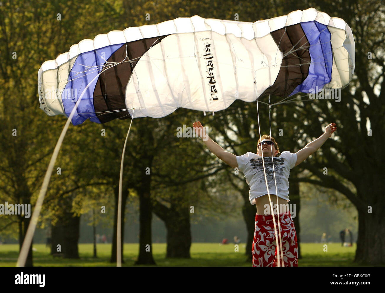 A man flies a giant kite on clapham common hi-res stock photography and ...