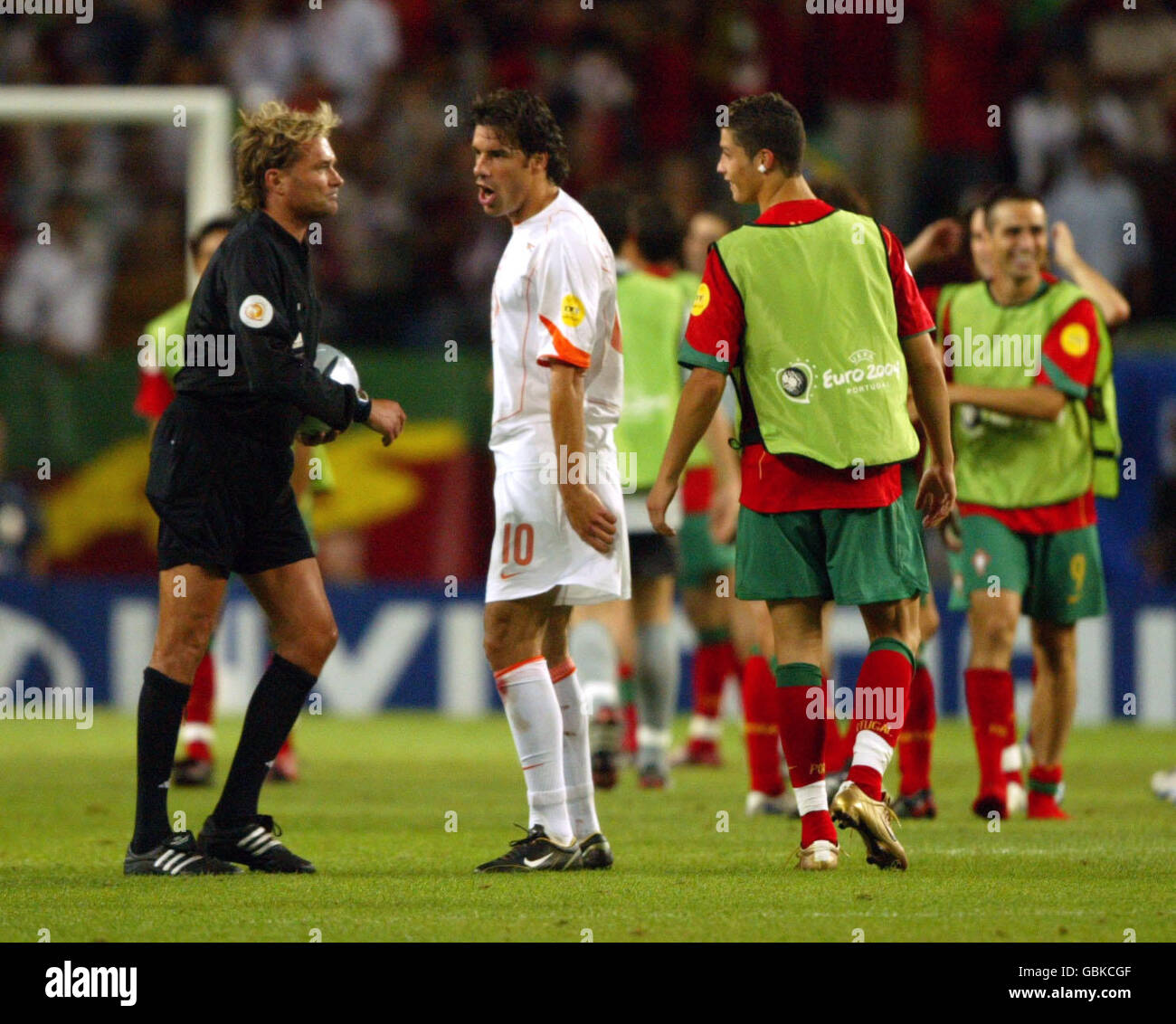 Holland's Ruud van Nistelrooy argues with referee Anders Frisk as ...