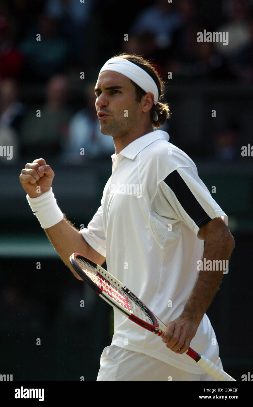 Roger federer celebrates winning a point during the match hi-res stock ...