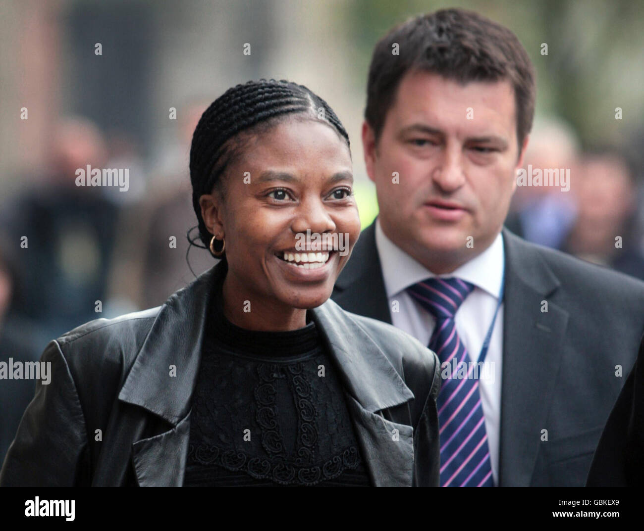 Magdeline Makola arrives with Detective Constable Kevin Houliston for ...