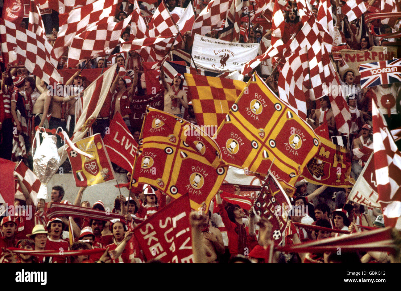 Liverpool fans wave red and white flags to get behind their team Stock ...
