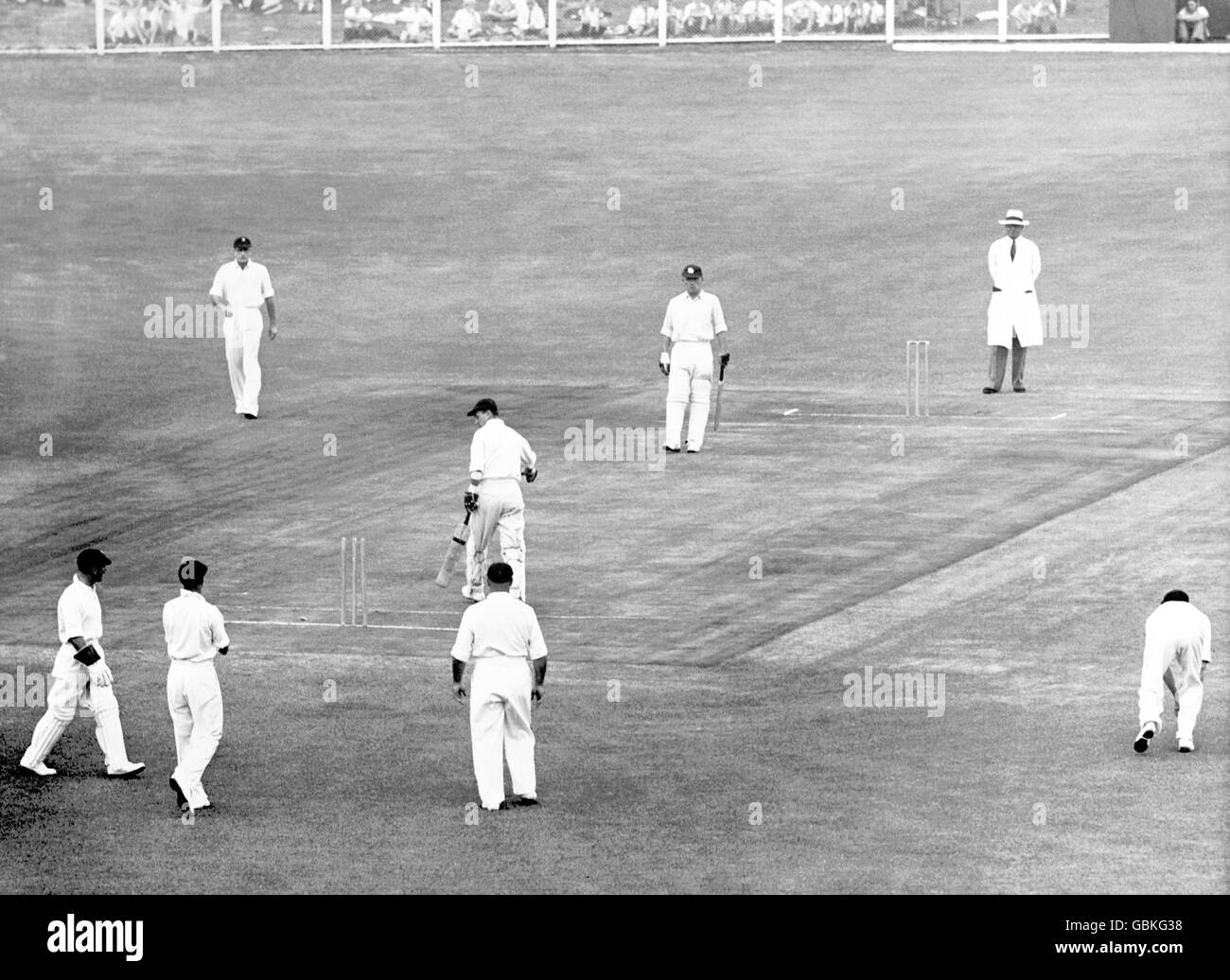 England's Len Hutton (c) starts to walk back towards the pavilion after ...