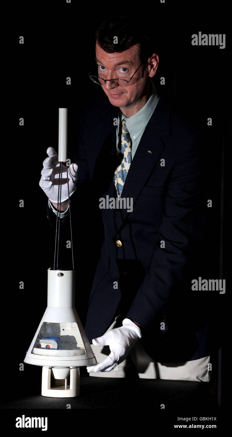 Holds a model of the mercury spacecraft at bonhams hi-res stock ...