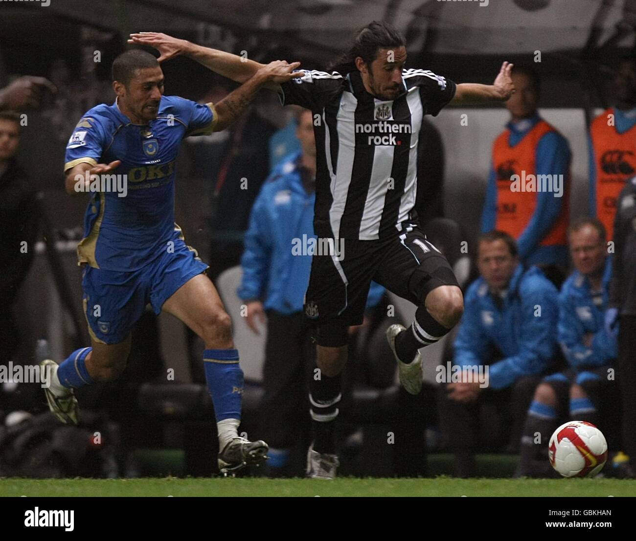Newcastle United's Jonas Gutierrez (right) and Portsmouth's Hayden ...