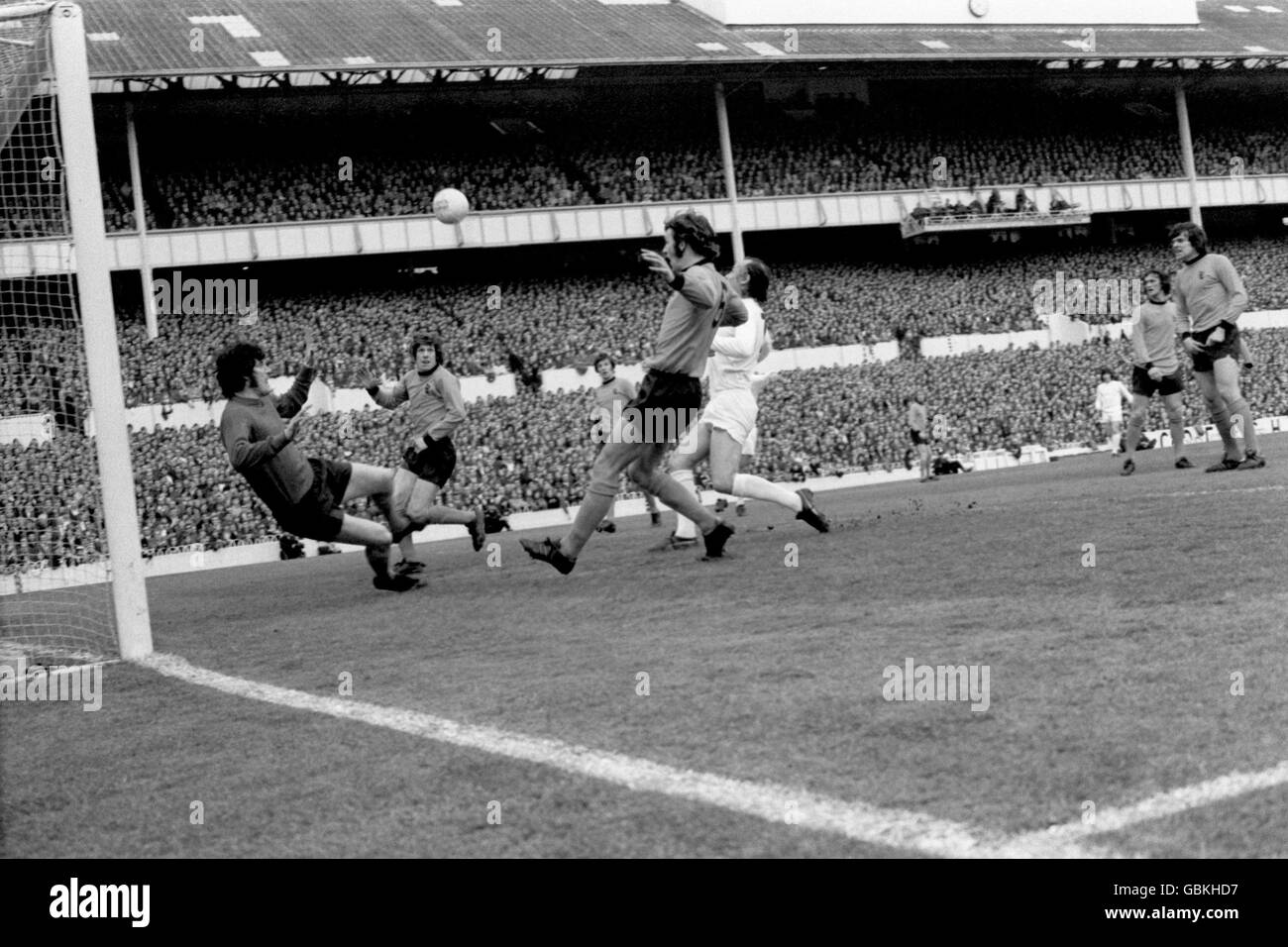 Tottenham Hotspur's Alan Gilzean (fourth l) races in to meet a cross as ...