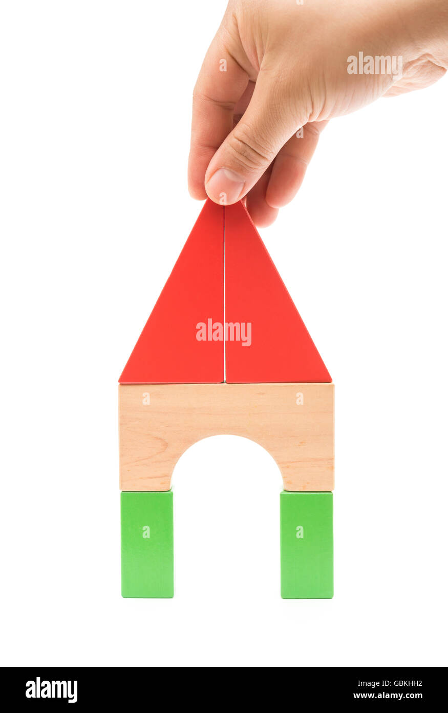 making toy blocks shape like a house on white background Stock Photo ...