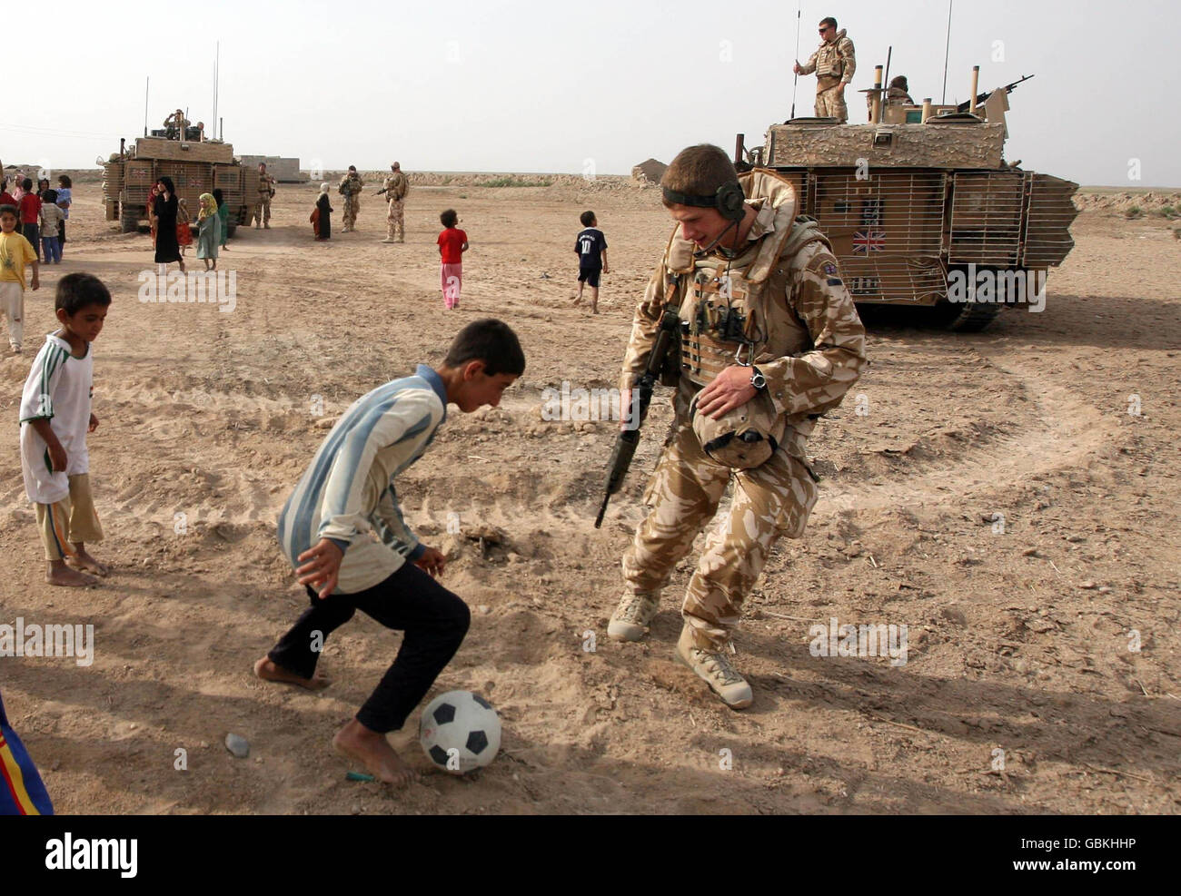 Children playing football in iraq hi-res stock photography and images ...