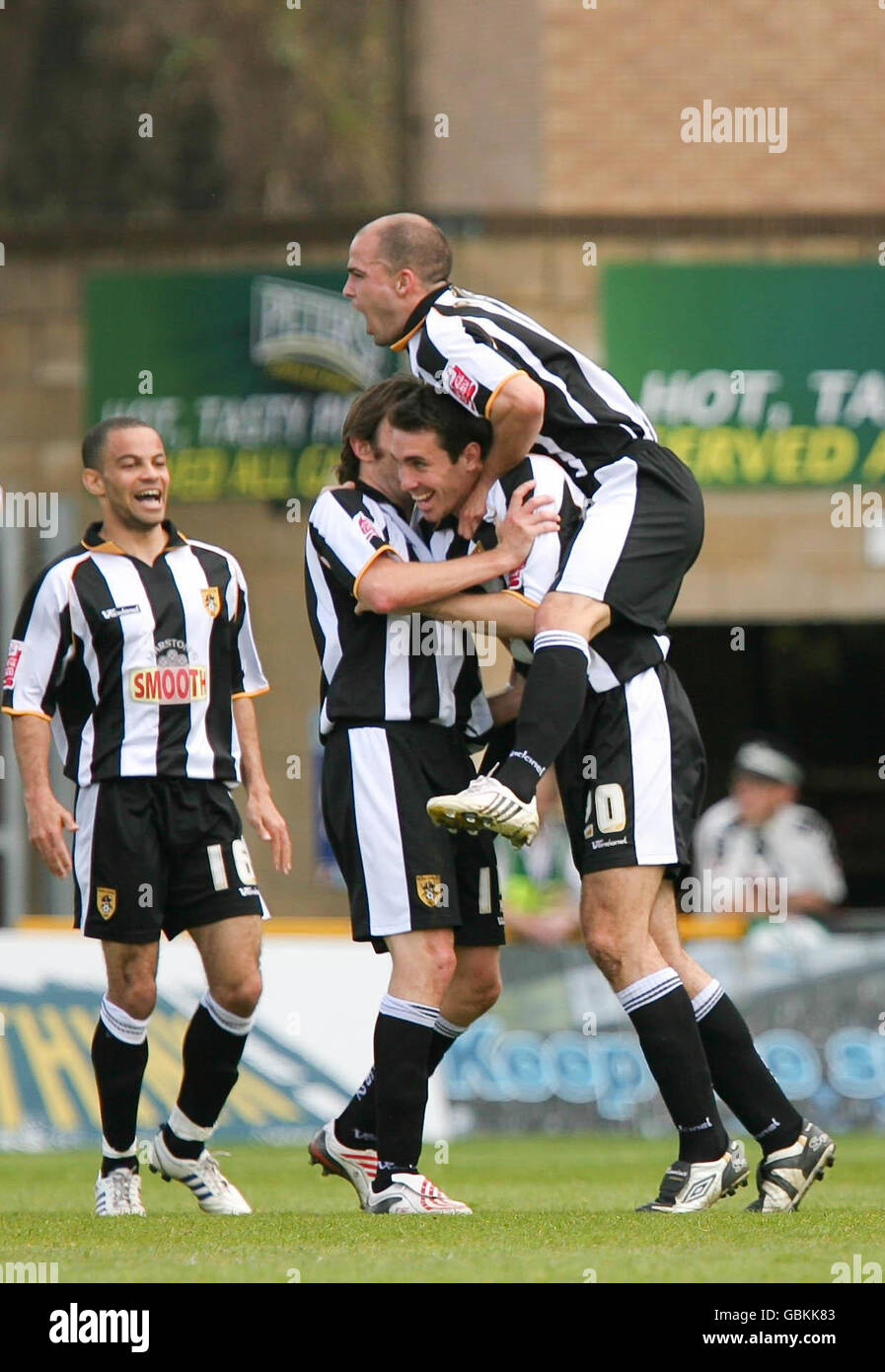 Notts County's John Thompson is mobbed by teammates after scoring ...