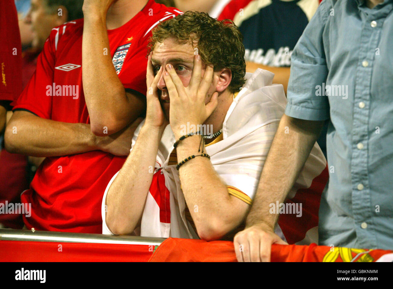 A dejected England fan cannot believe his team have been knocked out on ...