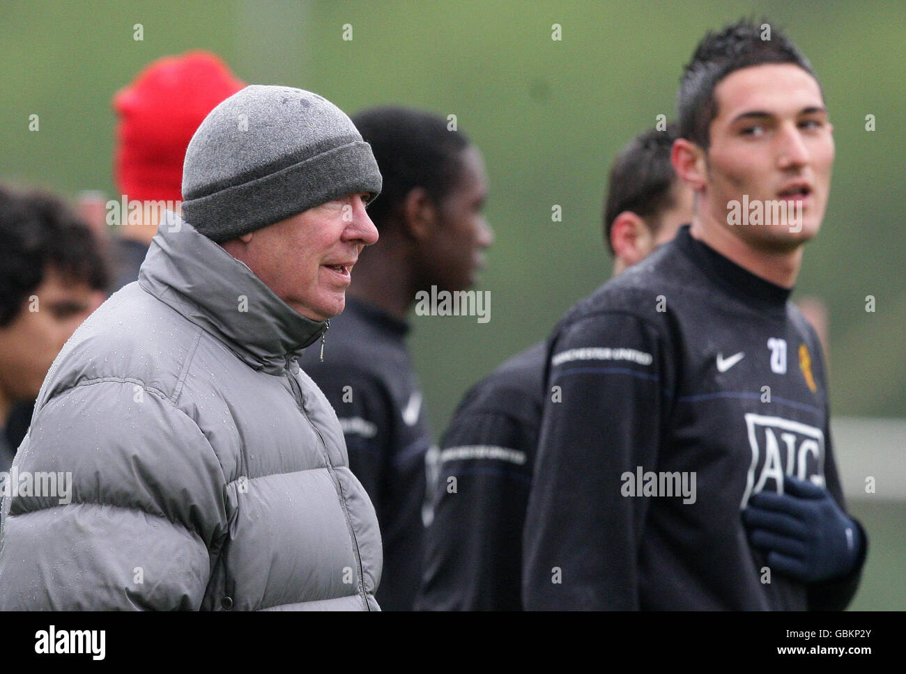 Manchester United's Federico Macheda (right) looks towards manager Sir ...