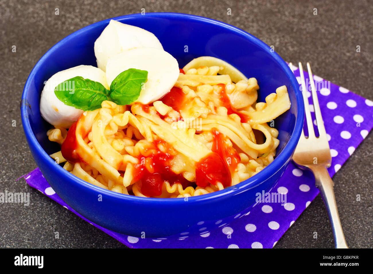 Pasta with Tomato Sauce Ketchup, Mozzarella and Basil Stock Photo - Alamy
