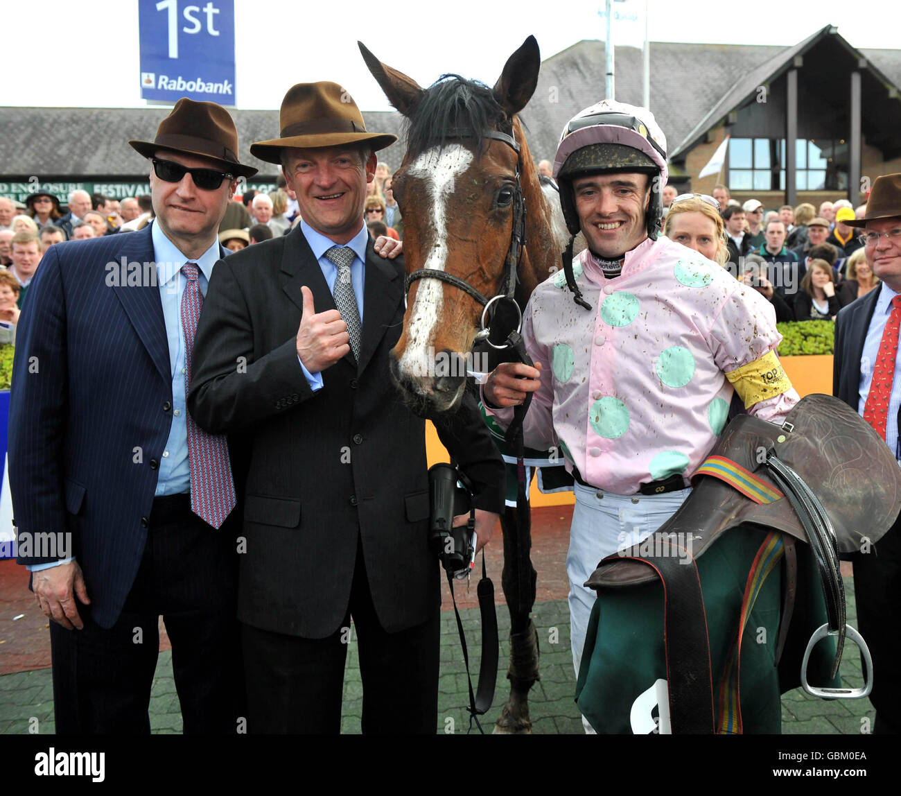 Jockey Ruby Walsh (right) with Trainer Willie Mullins (centre) after ...