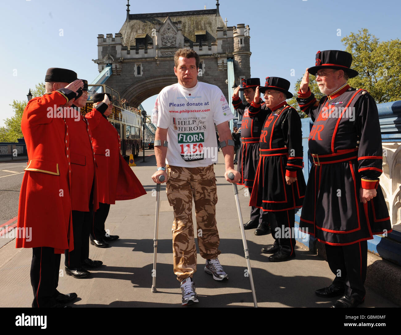 Major Phil Packer makes his way over Tower Bridge in London today were ...