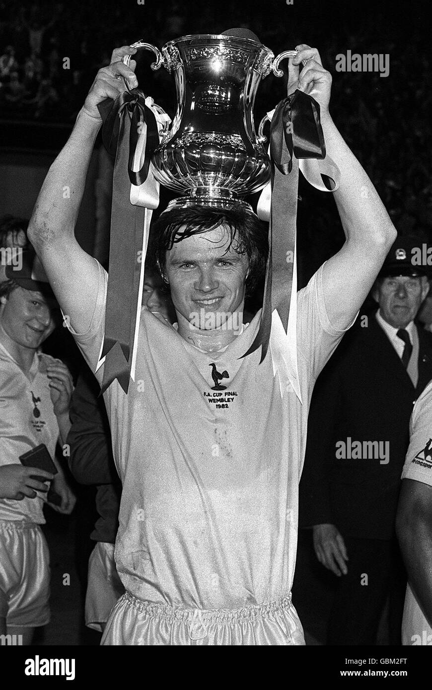 Tottenham hotspur captain steve perryman celebrates with the fa cup hi ...