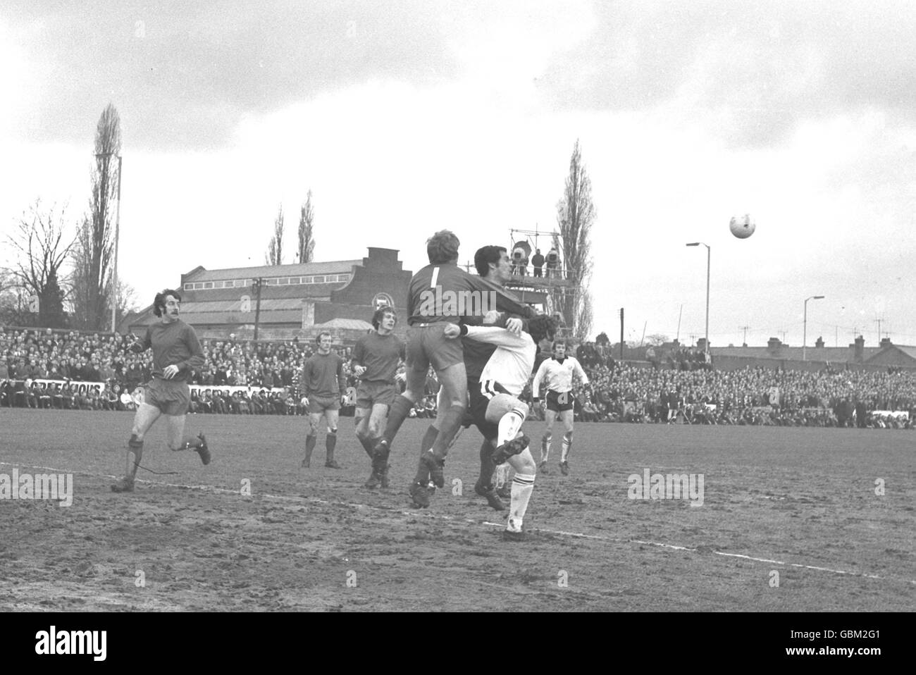 Newcastle United goalkeeper Iam McFaul (fourth l) punches clear ...