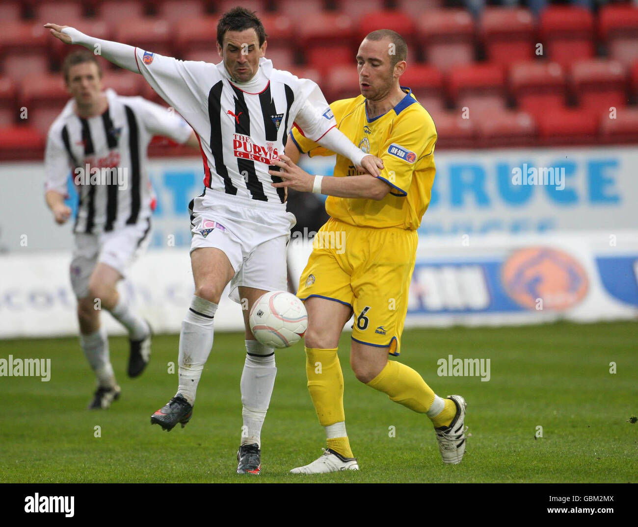 Dunfermline's David Graham and Morton's Steven Masterton battle for the ...