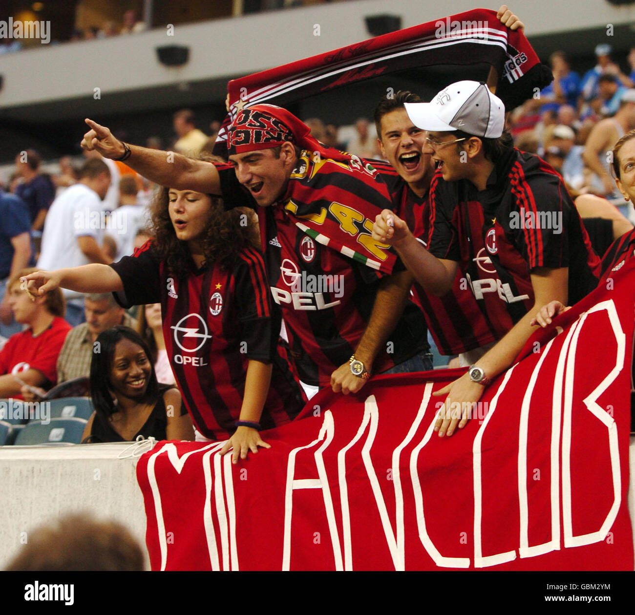 Ac milan supporters cheer on their team hi-res stock photography and ...