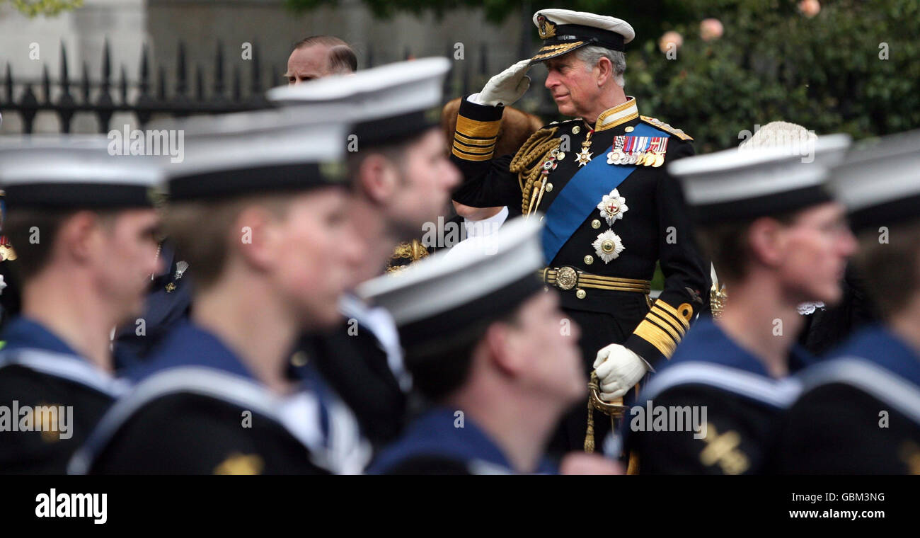 The Prince of Wales takes the Royal Salute at a march-past outside St ...