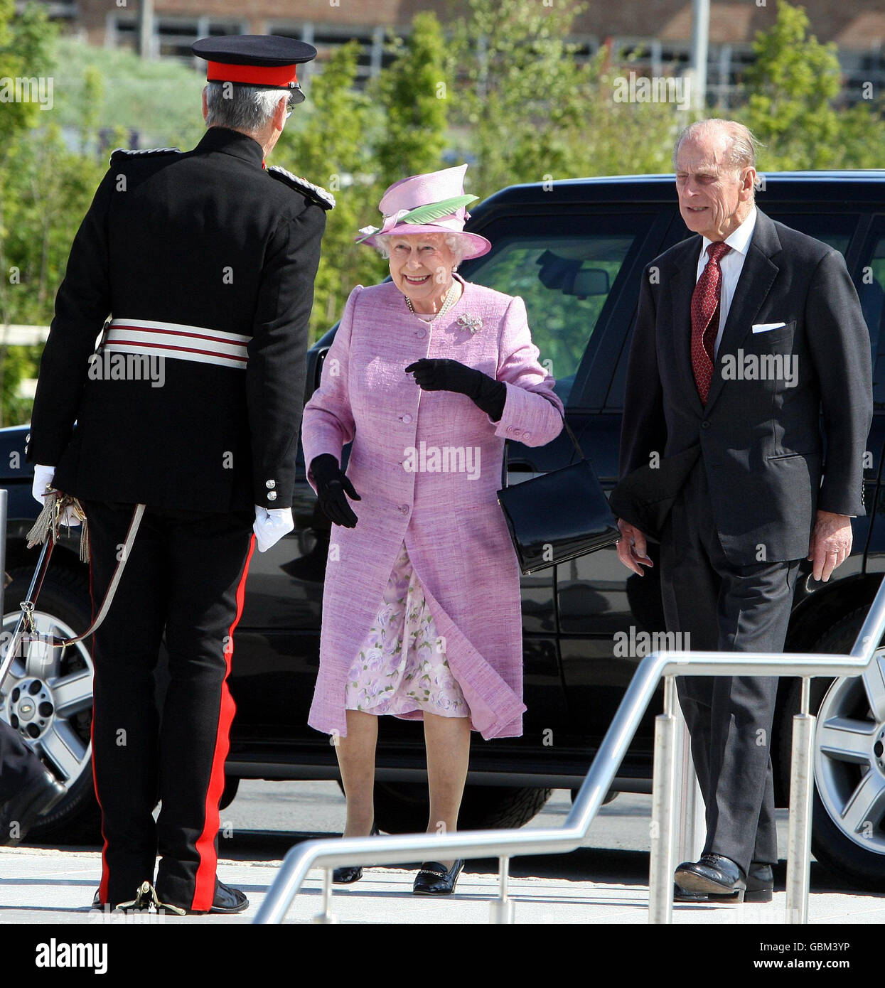Queen Elizabeth II and the Duke of Edinburgh speak with guests at the ...