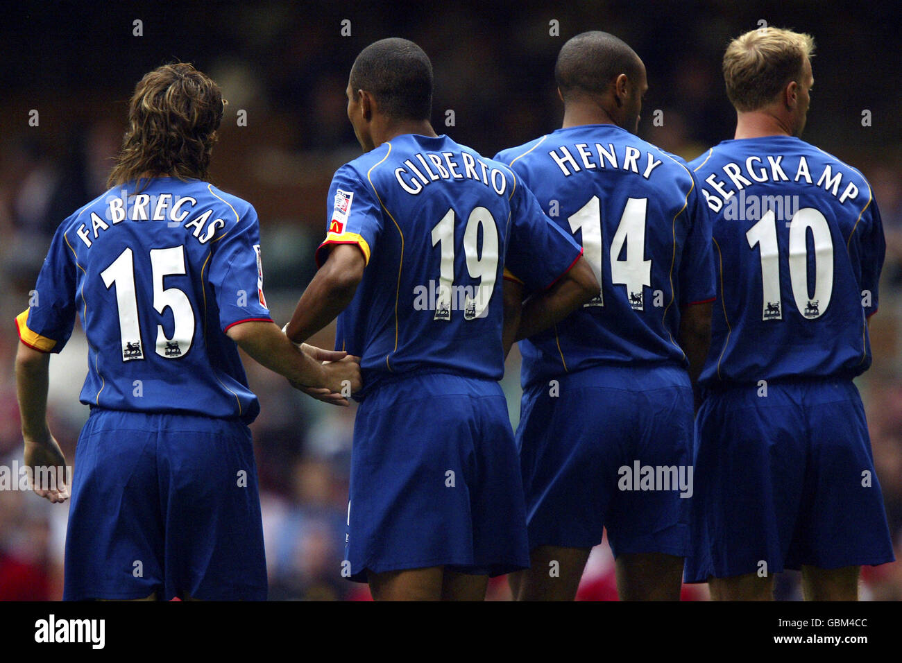 Thierry henry and dennis bergkamp form a defensive wall hi-res stock ...