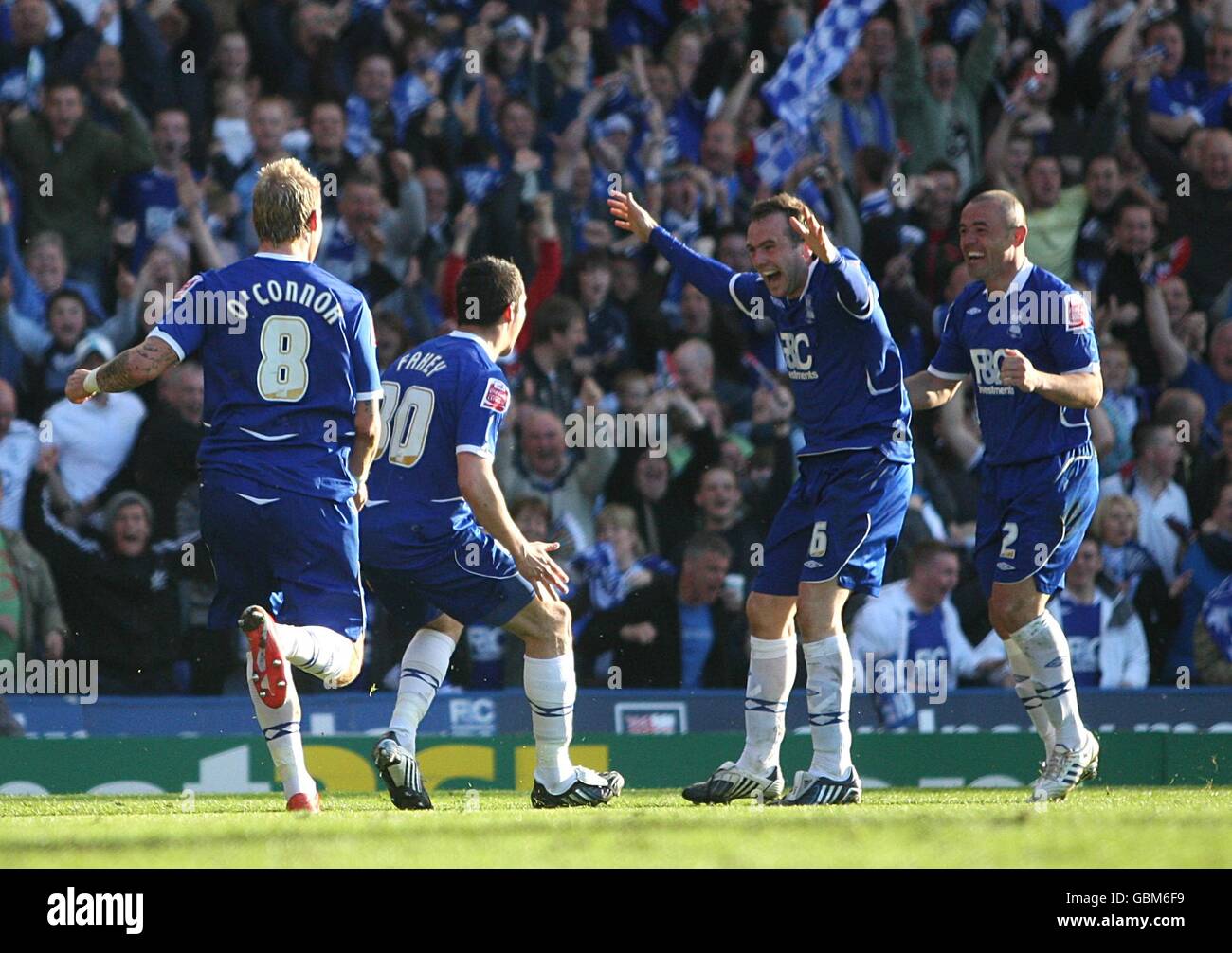 Birmingham City's Keith Fahey (2nd left) is congratulated by his team ...