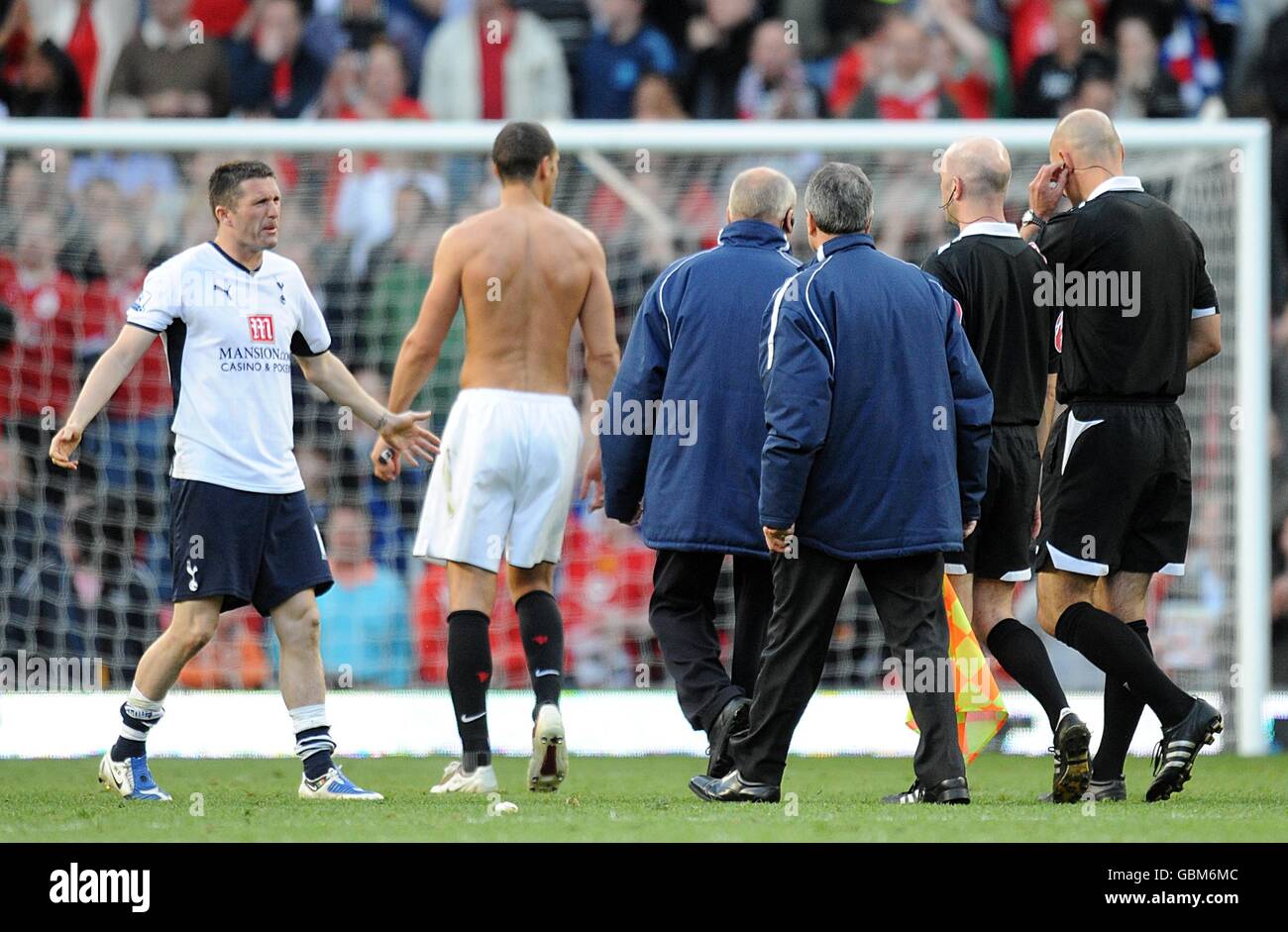 Tottenham Hotspur's Robbie Keane (left) makes his feelings known to ...