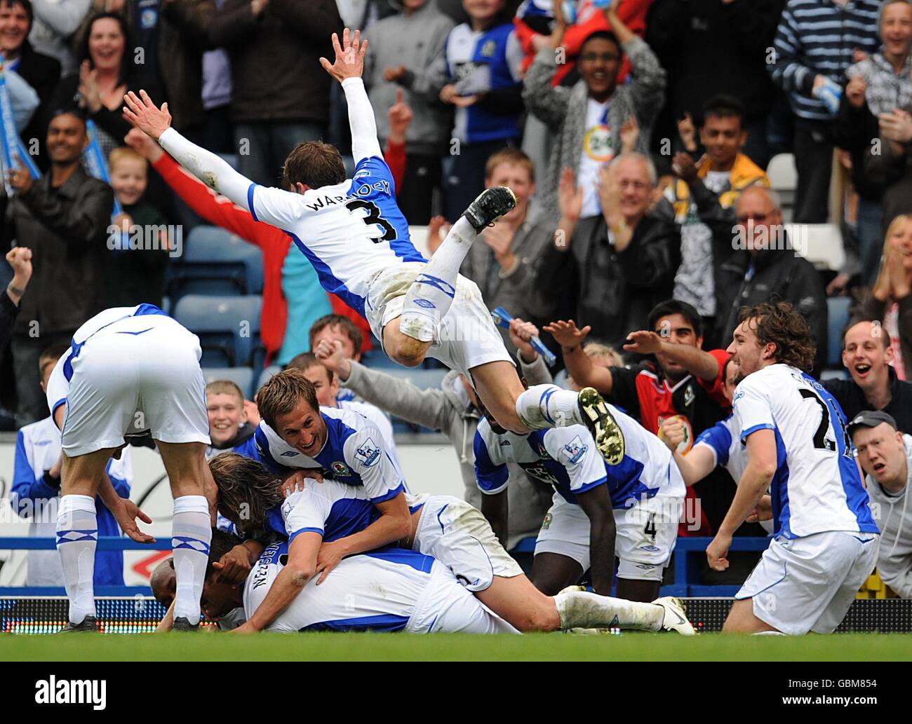 Blackburn Rovers' Stephen Warnock (centre) joins the celebrations after ...