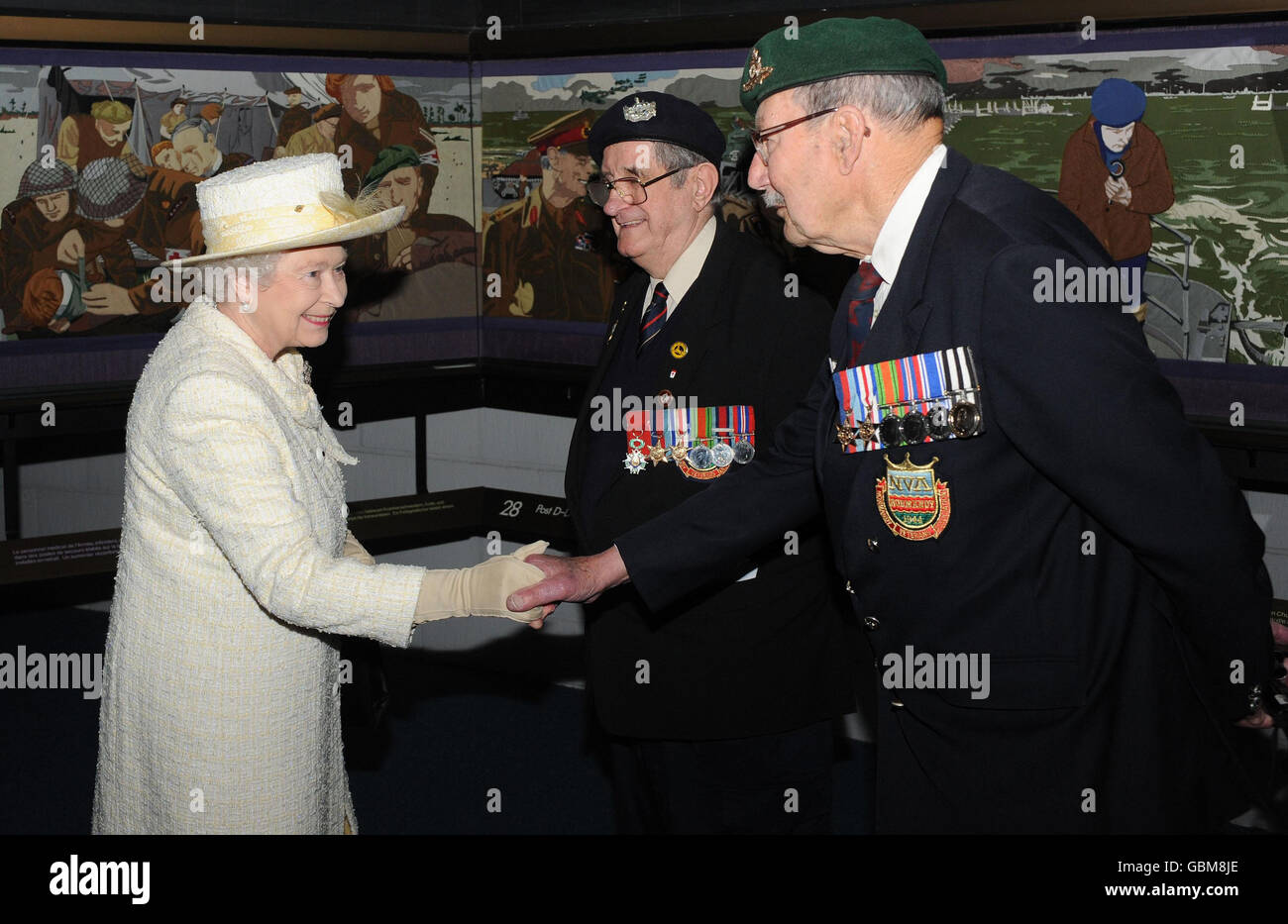 Britain's Queen Elizabeth II meets with D-Day veterans Frank Rosier and ...