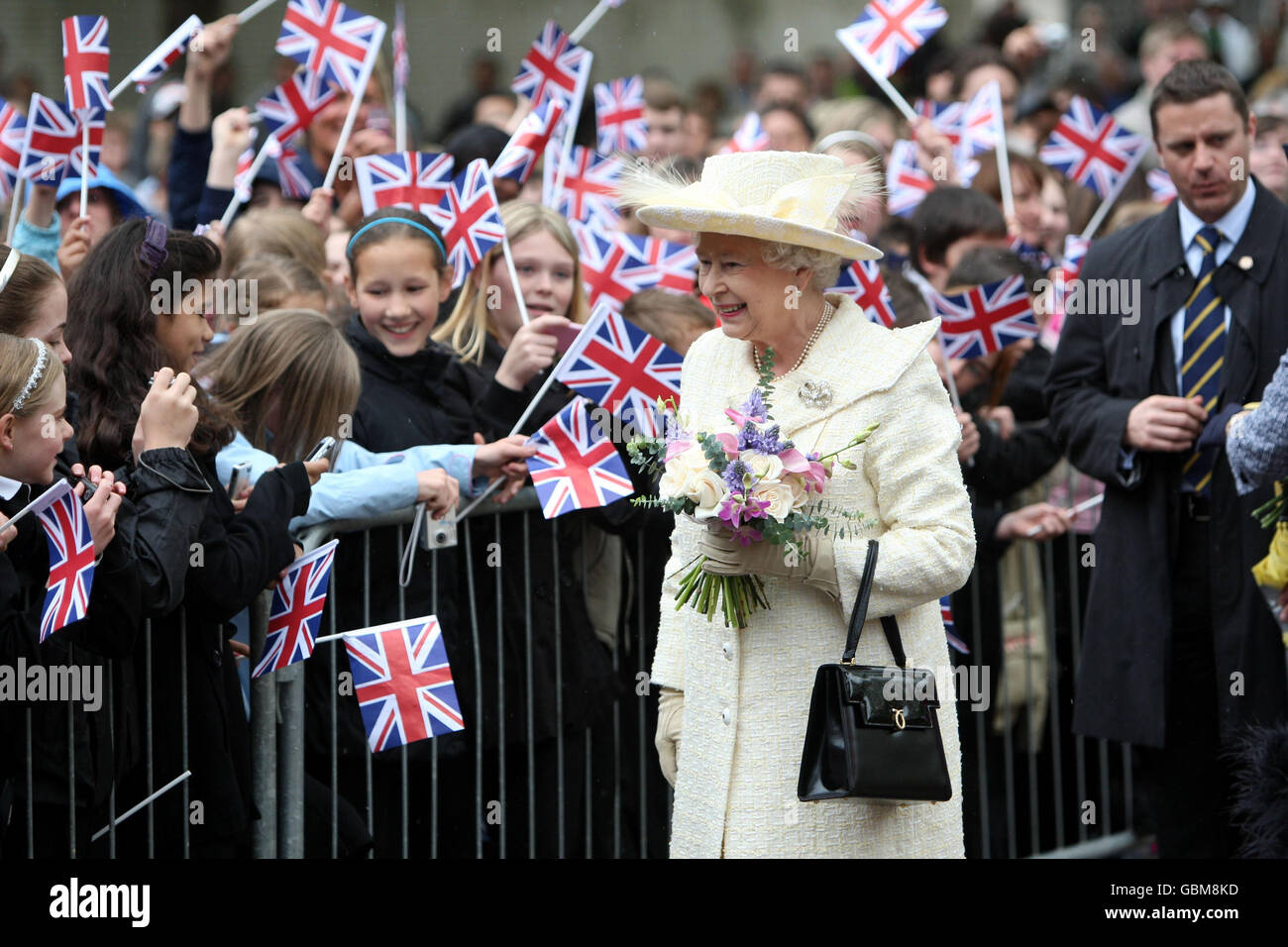 Britain's Queen Elizabeth II meets with the public as she arrives at ...