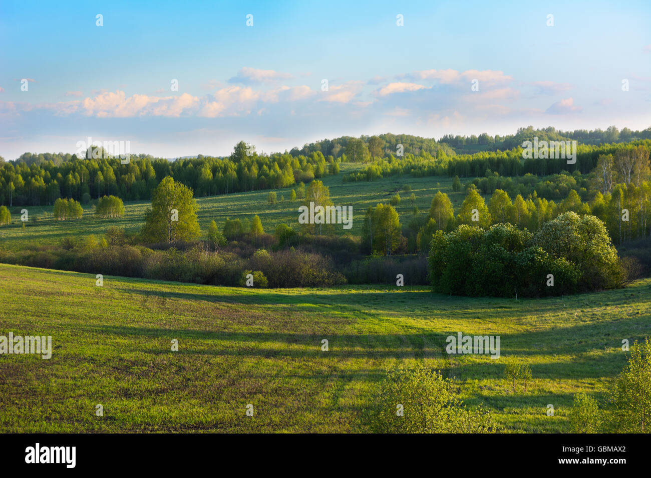 Summer sunset over beautiful hills landscape. Hillside landscape ...