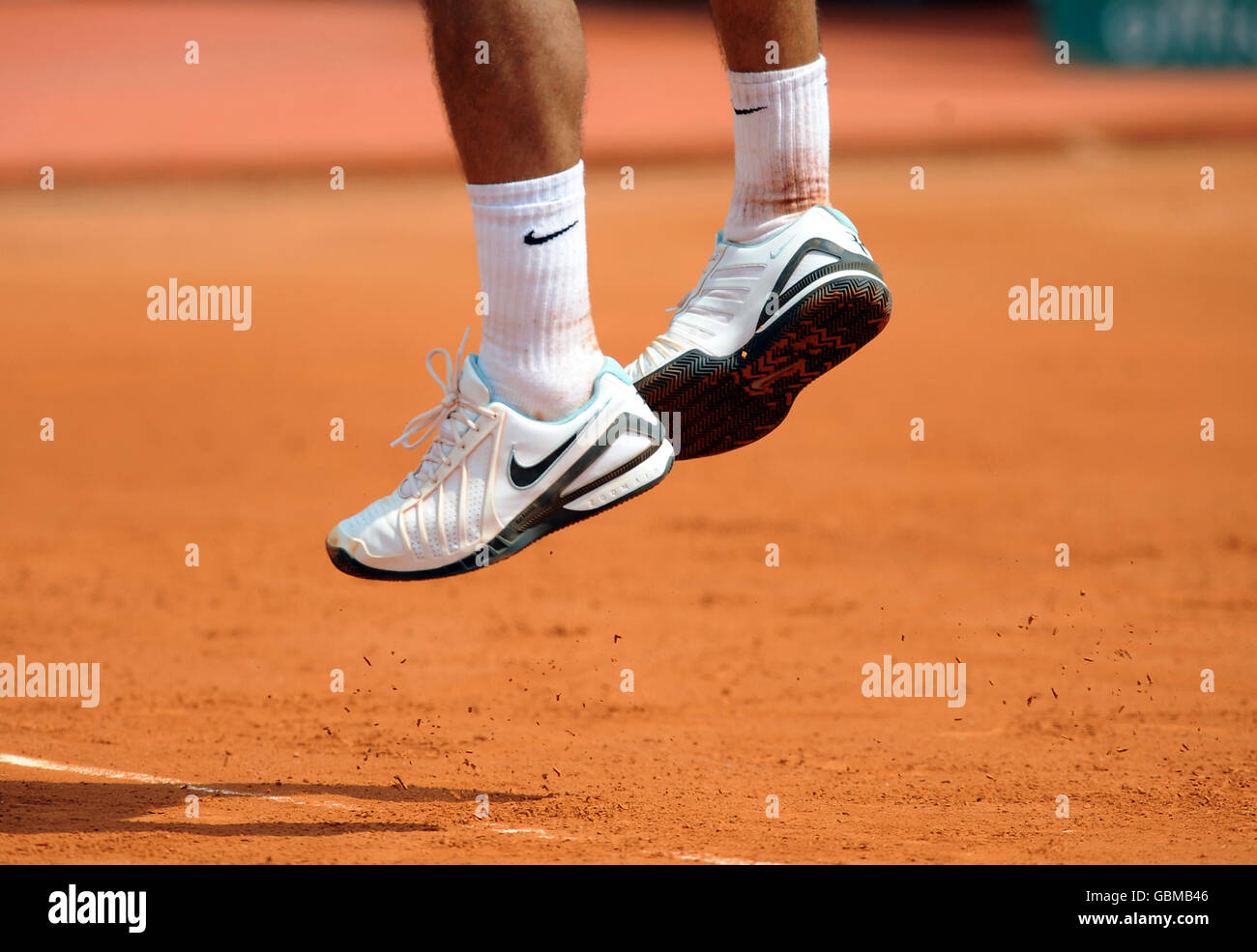 The feet of switzerlands roger federer as he serves hi-res stock ...