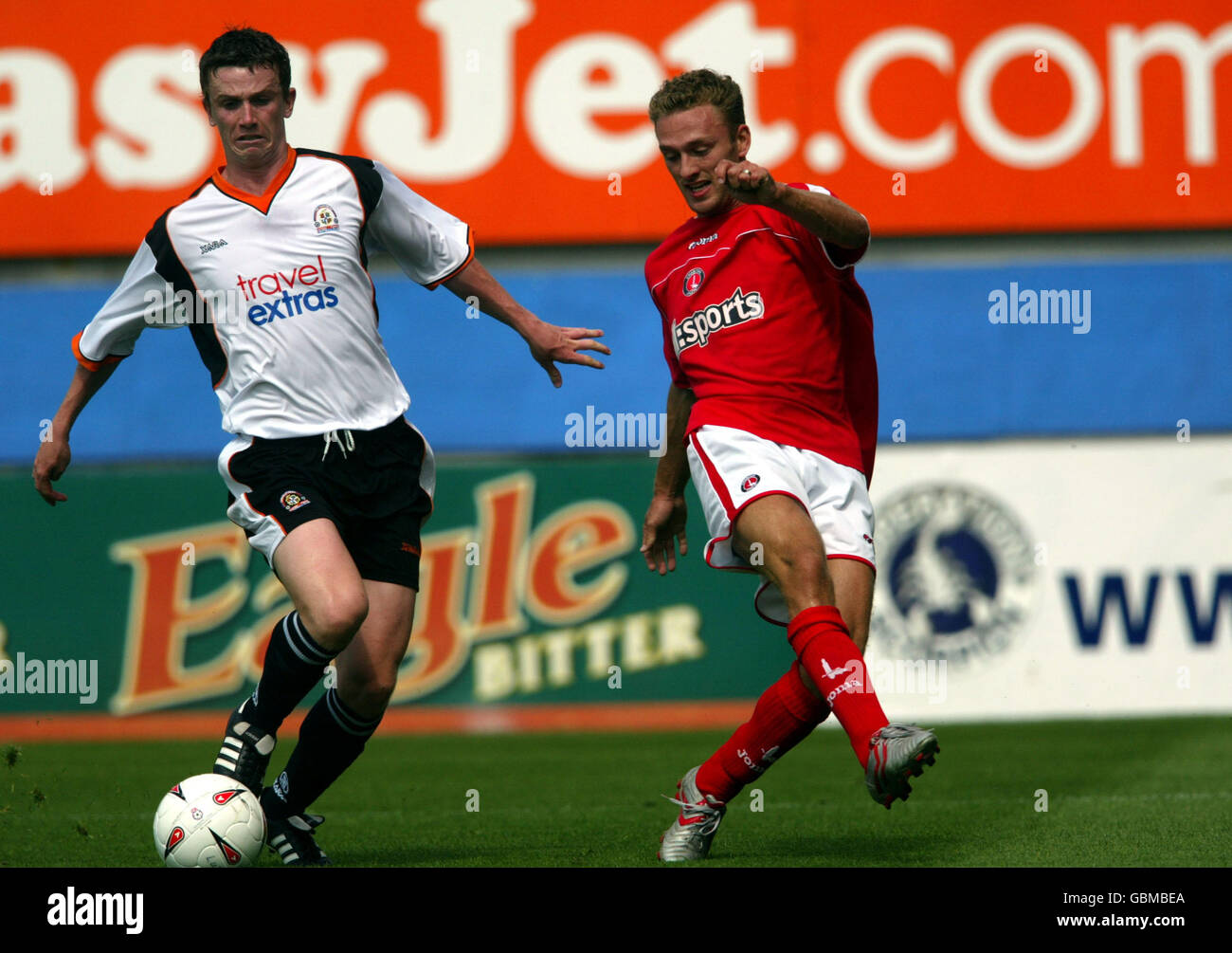 Luton Town's Kevin Foley and Charlton Athletic's Dennis Rommedahl ...
