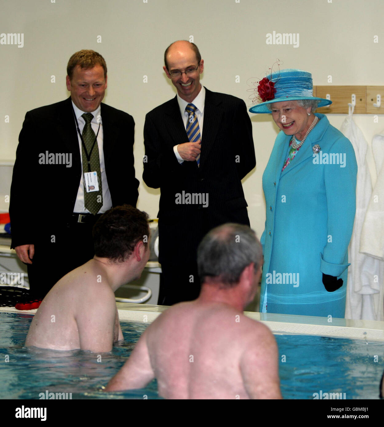 Britain's Queen Elizabeth II meets patients at the new hydro pool at ...