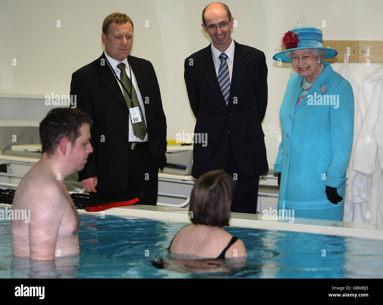 Britain's Queen Elizabeth II meets patients at the new hydro pool at ...