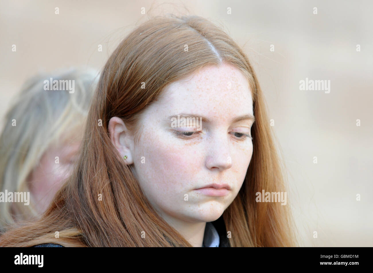 Matthew Pyke's girlfriend Joanna Witton listens to a statement being ...