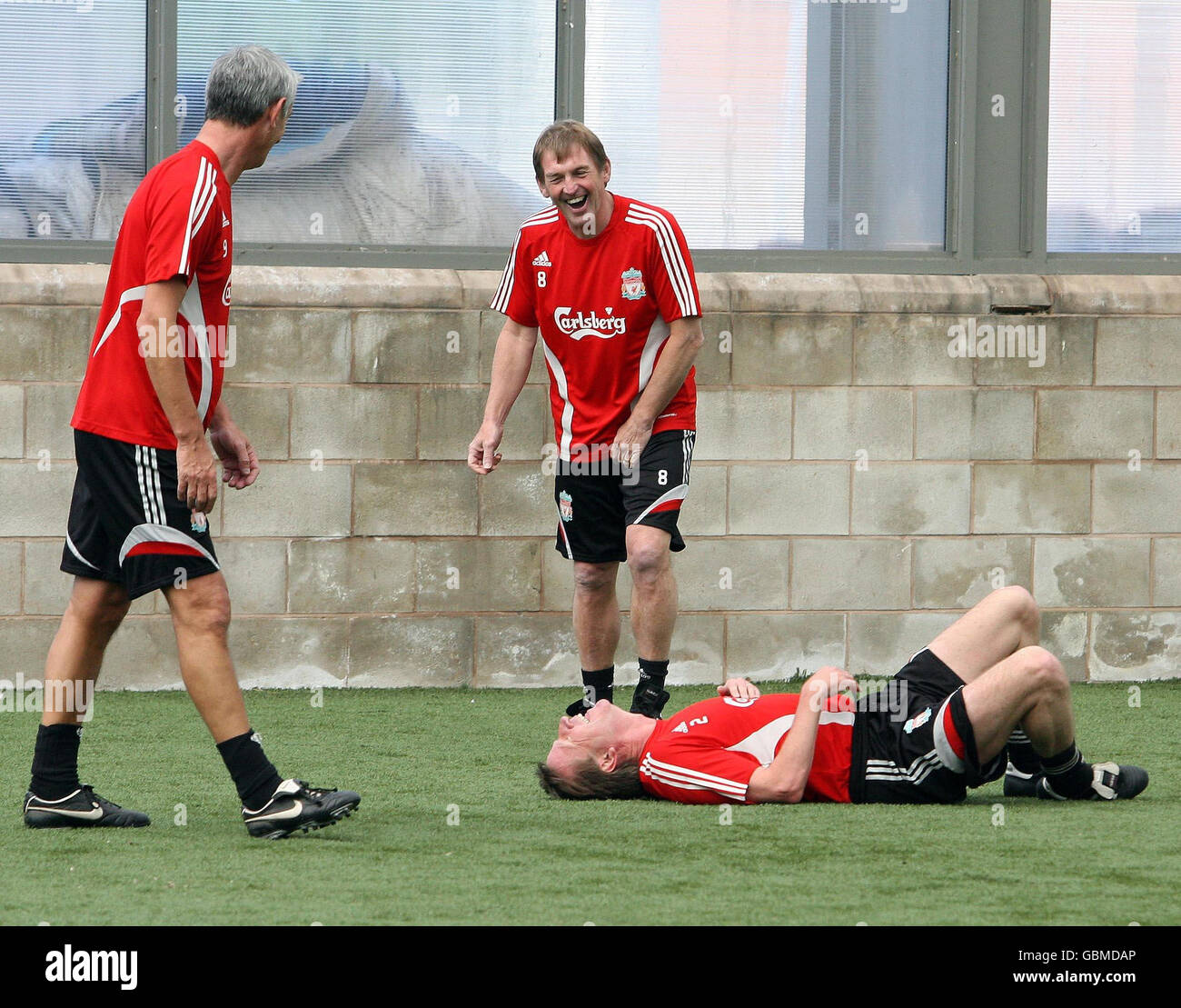 Ian Rush (left) and Kenny Dalglish laugh with Ronnie Whelan (floor ...