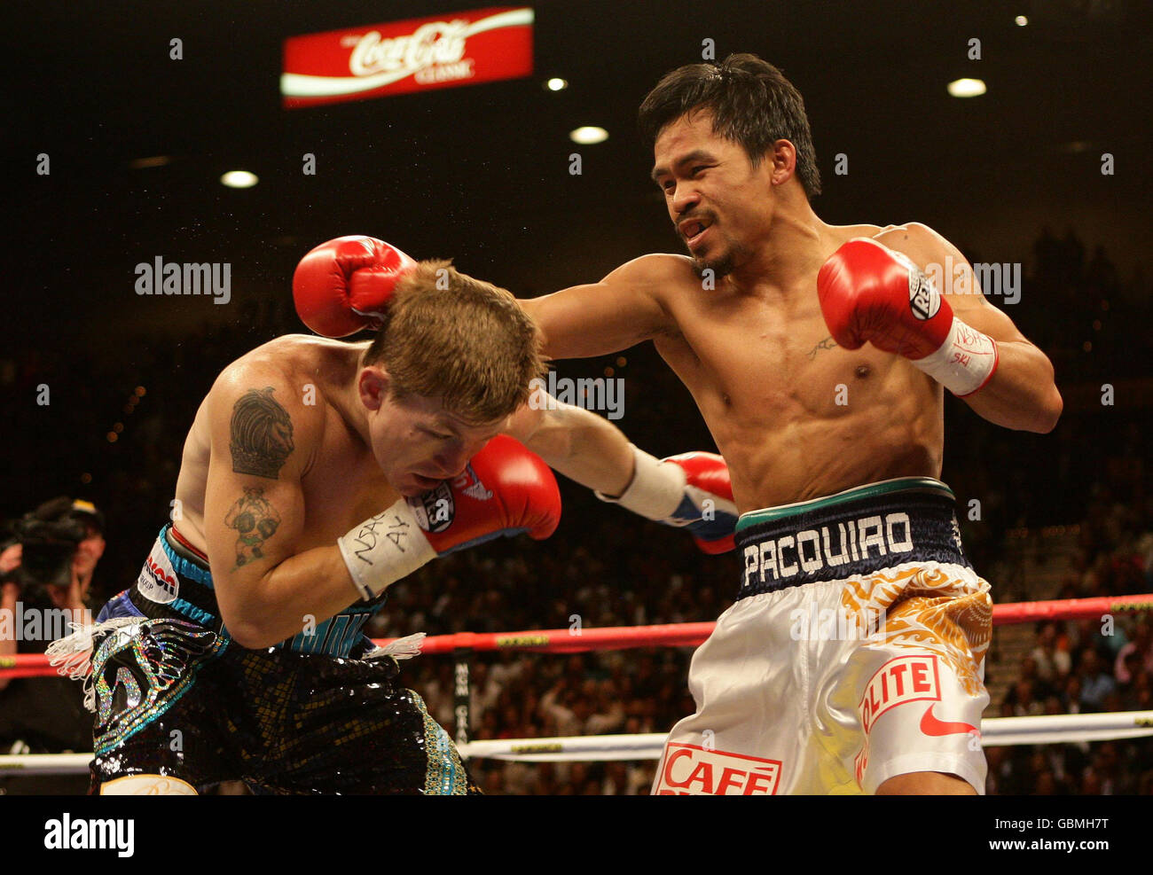 Ricky Hatton ducks from a punch thrown by Manny Pacquiao during the ...