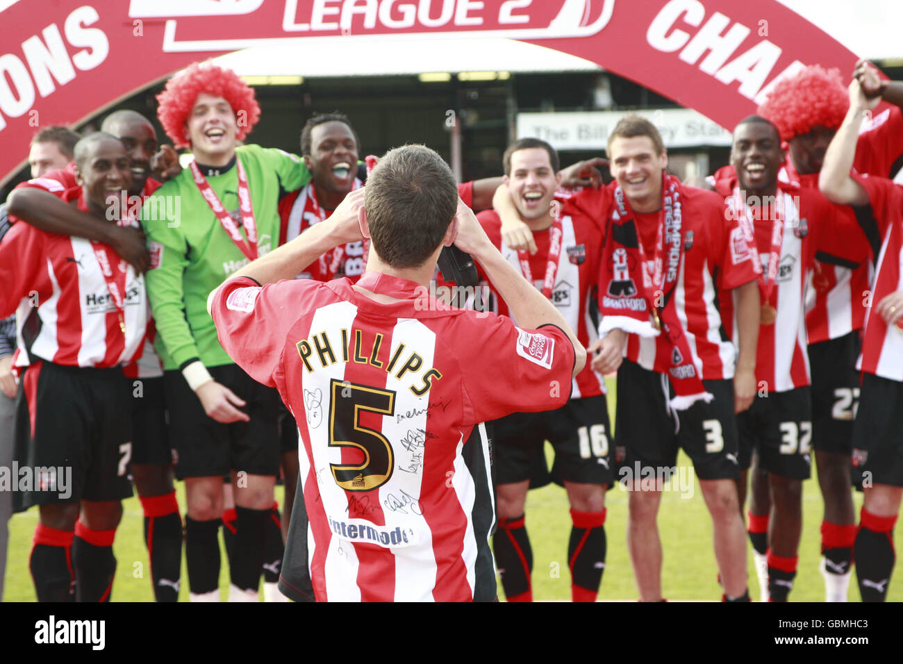 Mark Phillips takes a picture of his team mates during the Coca-Cola ...
