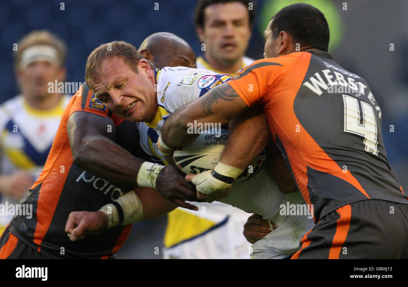Hull KR's Jake Webster stops Warrington's Ben Westwood during the ...