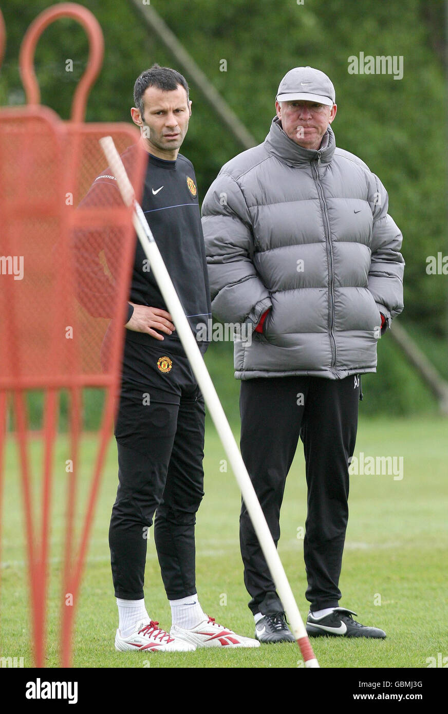 Sir alex ferguson during training session at carrington training ground ...