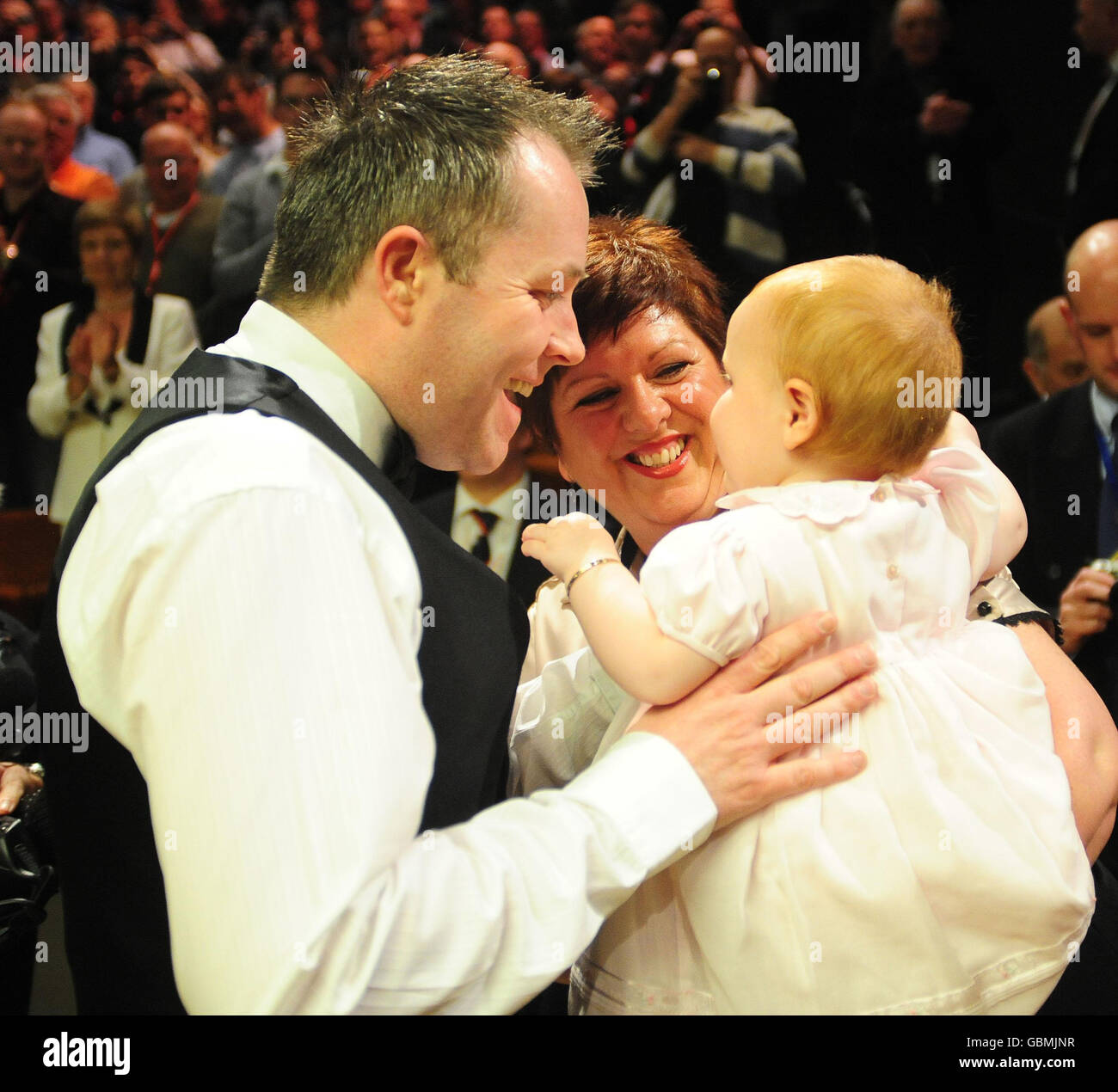 Scotland's John Higgins is greeted by his daughter Claudia after ...