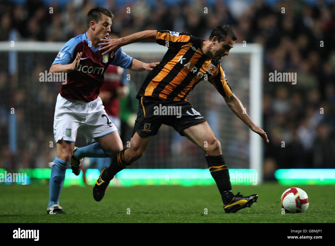 Aston Villa's Nicky Shorey and Hull City's Richard Garcia (right ...