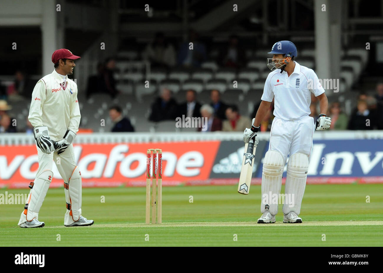 West Indian's Denesh Ramdin (left) shares a joke with England's Ravi ...