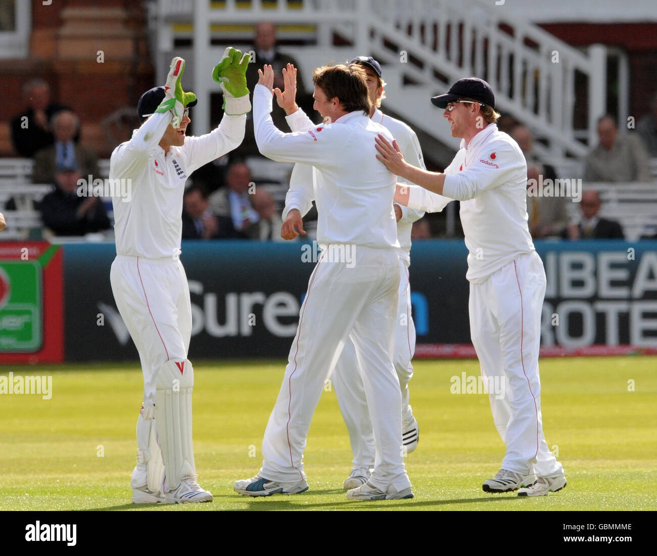 England's Graeme Swann celebrates taking the wicket of Sulieman Benn ...