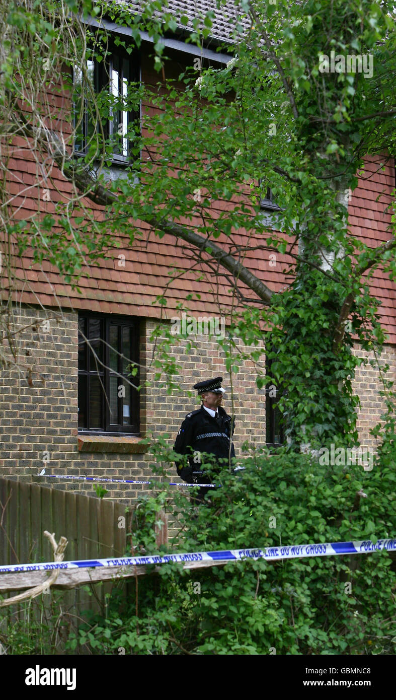 A police officer remains at the back of the home of Mervyn Tussler, as ...