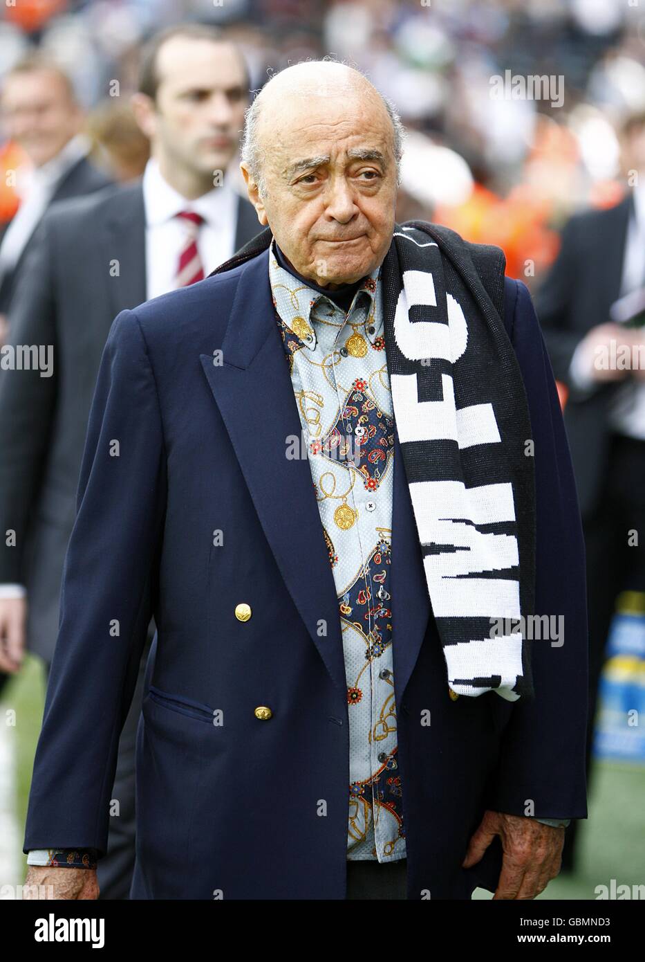 Fulham chairman Mohamed Al Fayed on the pitch before the match Stock ...