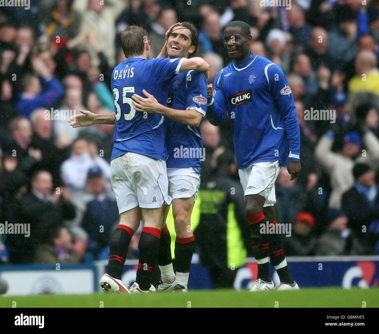 Rangers' Steven Davis, Mo Edu and Pedro Mendes celebrate winning the ...