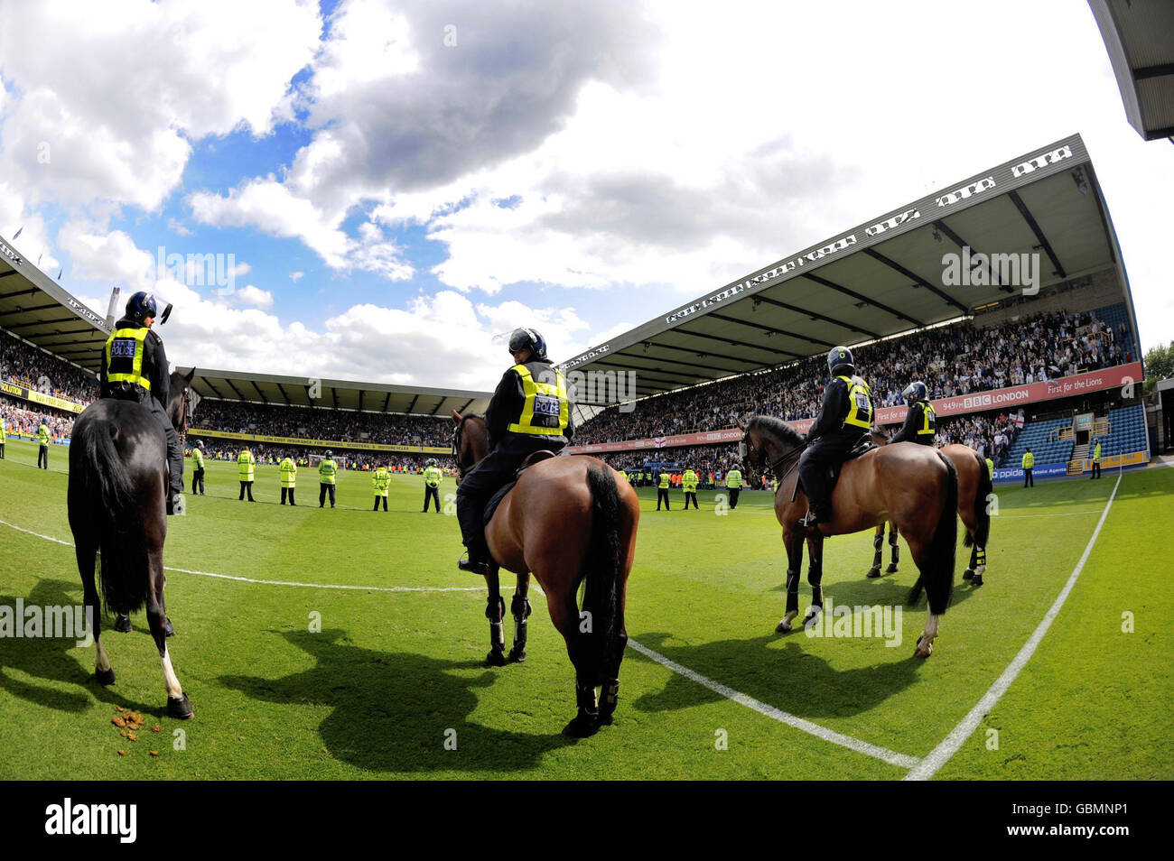 Mounted Police Officers keep watch following the Coca-Cola Football ...